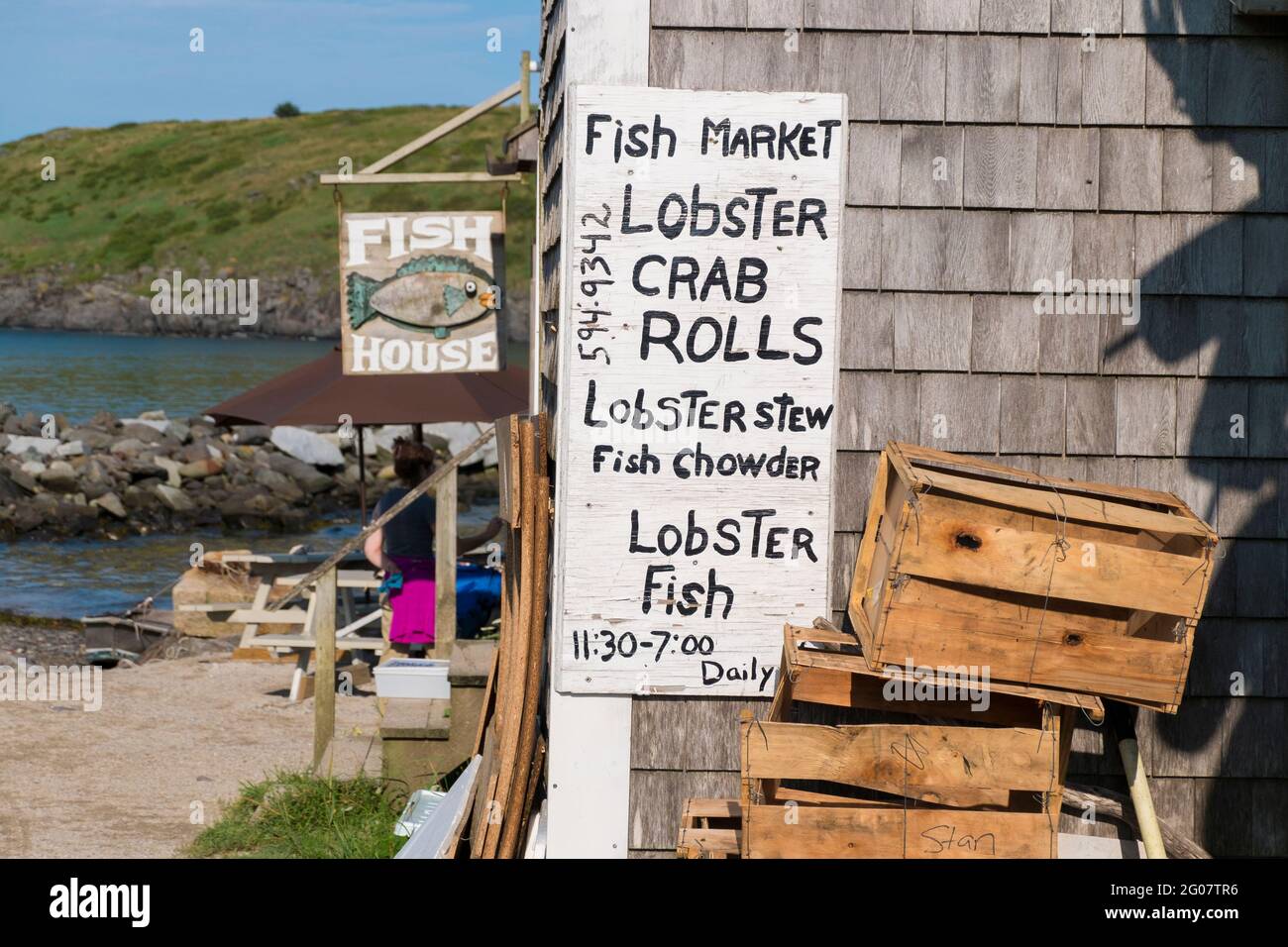 A handpainted, written sign for the Fish Market with the day's ...