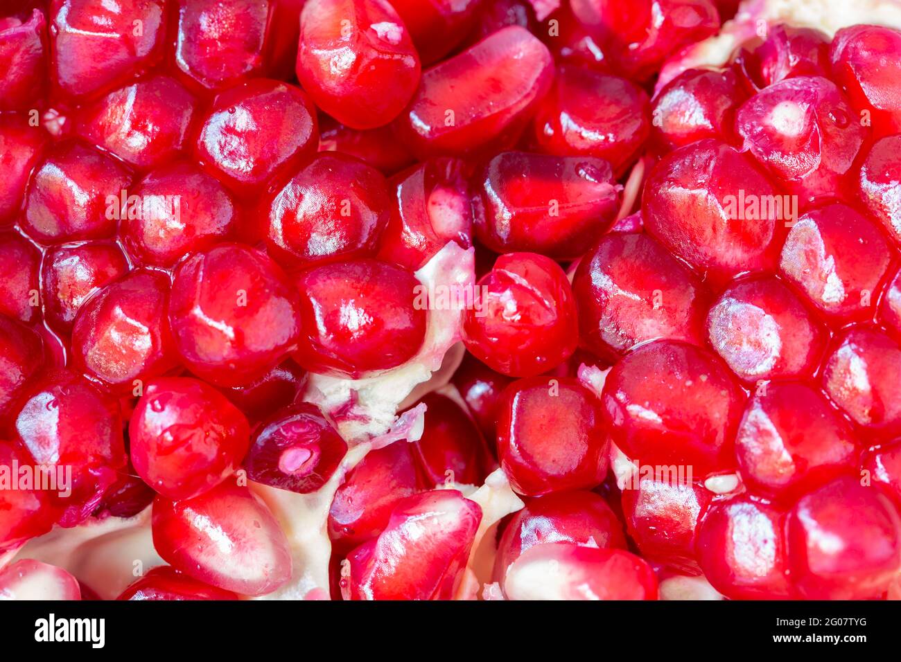 pomegranate fruit grain closeup, texture and background Stock Photo - Alamy