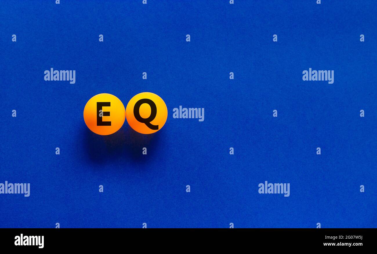 EQ, emotional quotient symbol. Orange table tennis balls with words 'EQ ...