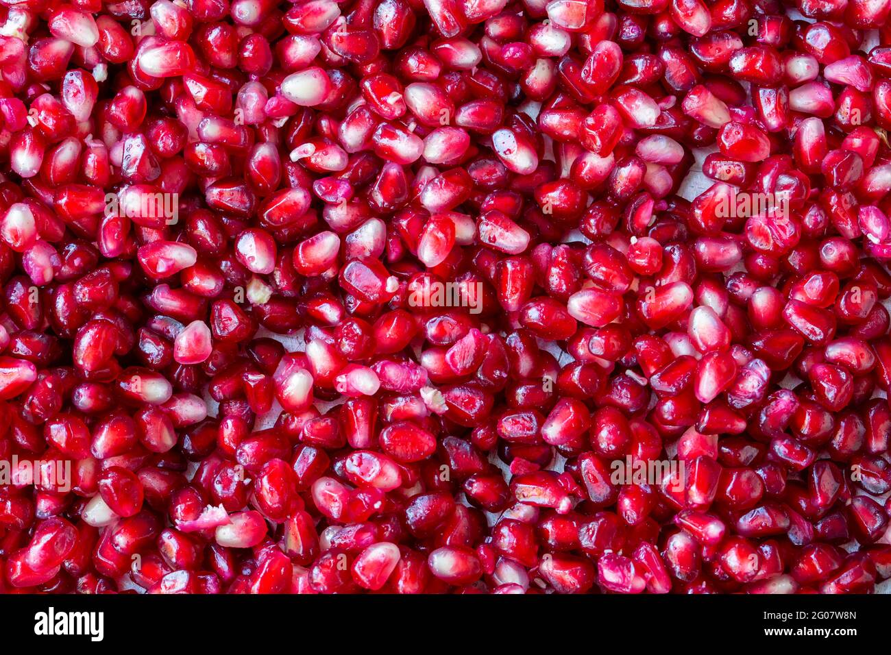 pomegranate fruit grain closeup, texture and background Stock Photo - Alamy