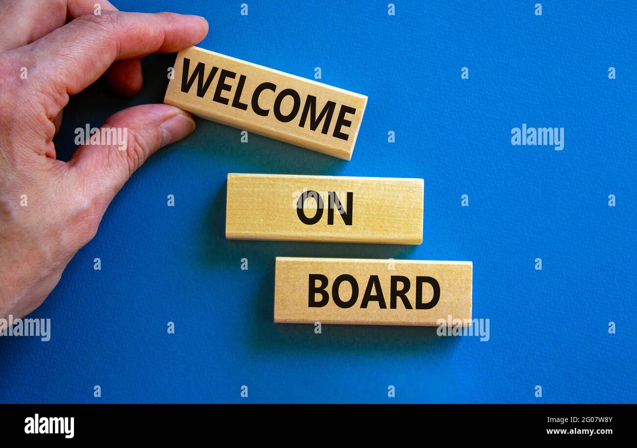 Welcome on board symbol. Wooden blocks with words 'Welcome on board ...