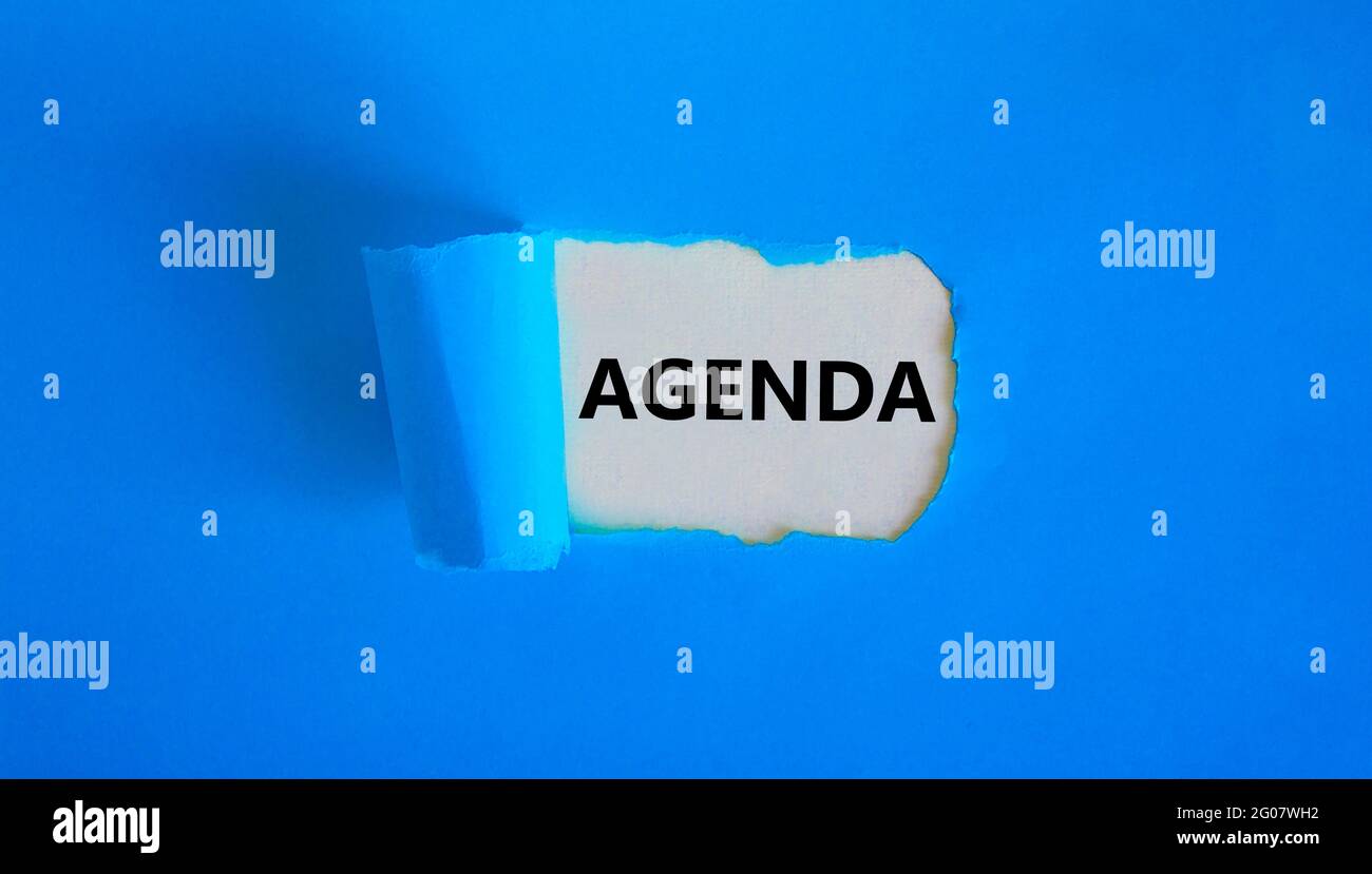 Business and agenda symbol. The concept word 'agenda' appearing behind ...