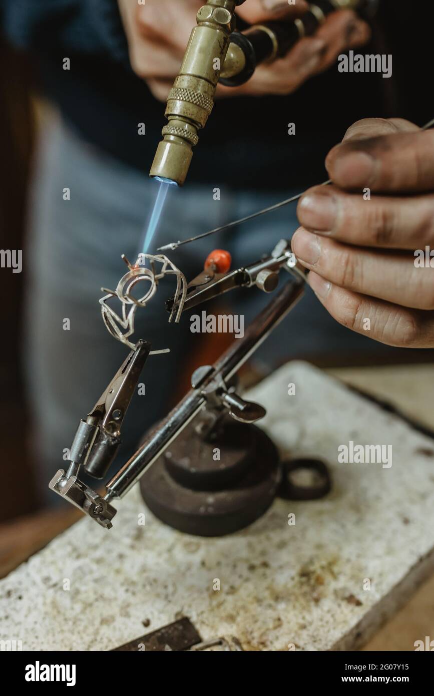 Male jeweler using equipment hi-res stock photography and images - Alamy