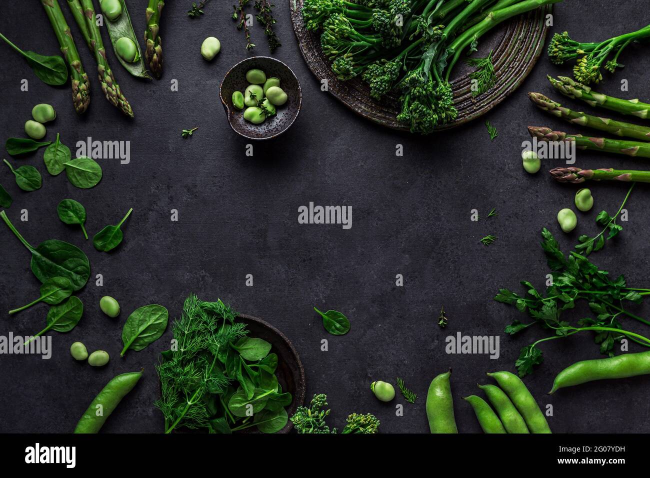 Overhead composition of organic vegetarian healthy greenery of bunches ...