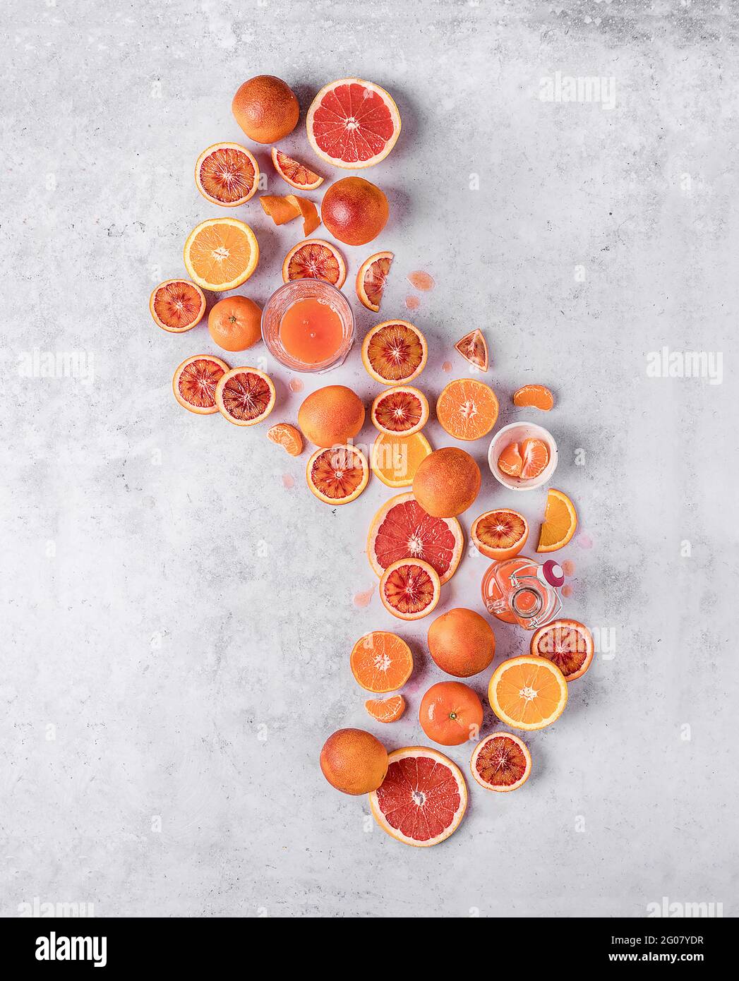 Top view of sanguine fruit on white table cut into half parts Stock ...