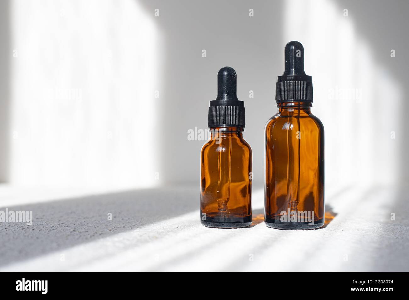 Glass bottle of mineral beauty oil with dropper for skin, hair. Product ...
