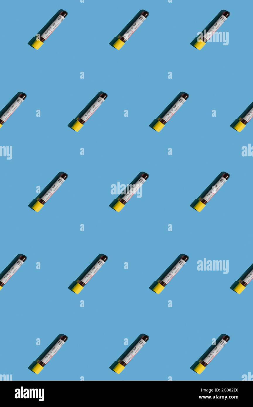 Top view of mosaic or pattern of positive blood tests over blue ...