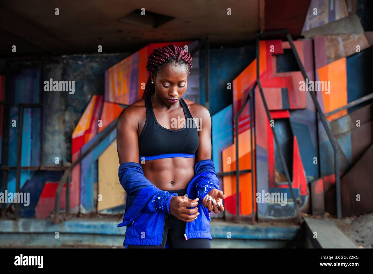 Taking off jacket hi-res stock photography and images - Alamy