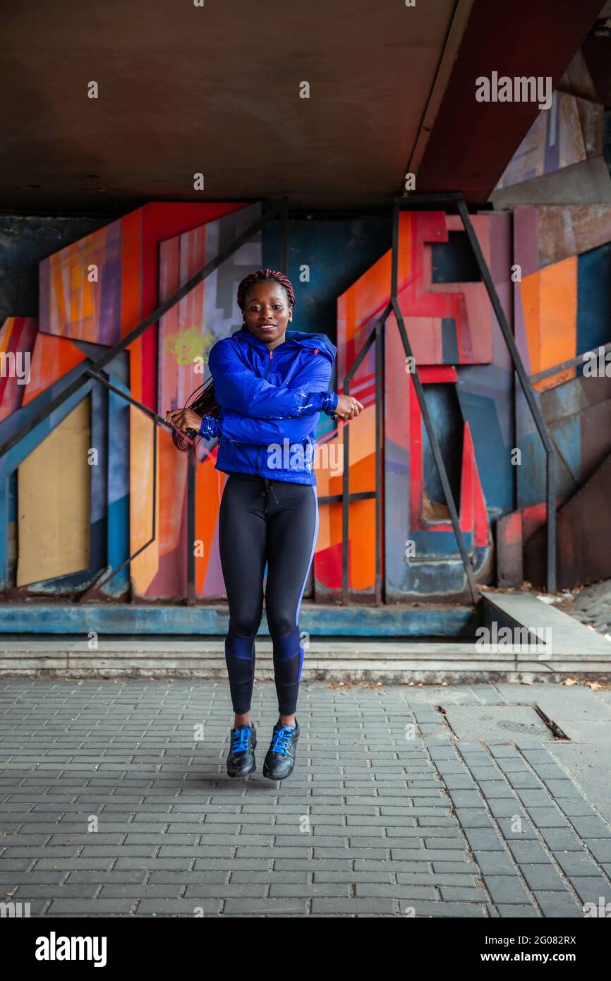 African american woman braids exercising hi-res stock photography and ...