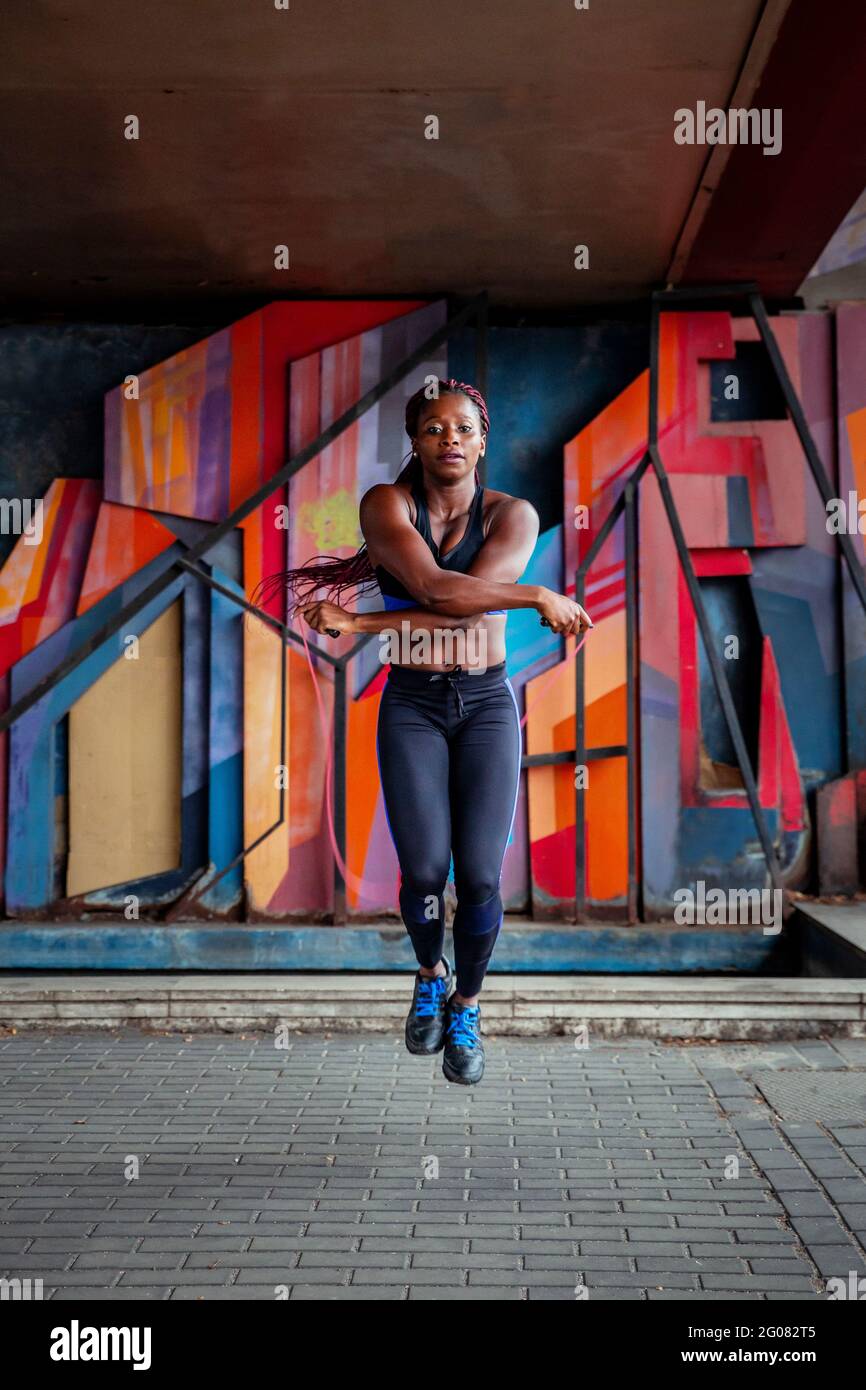 African american woman braids exercising hi-res stock photography and ...
