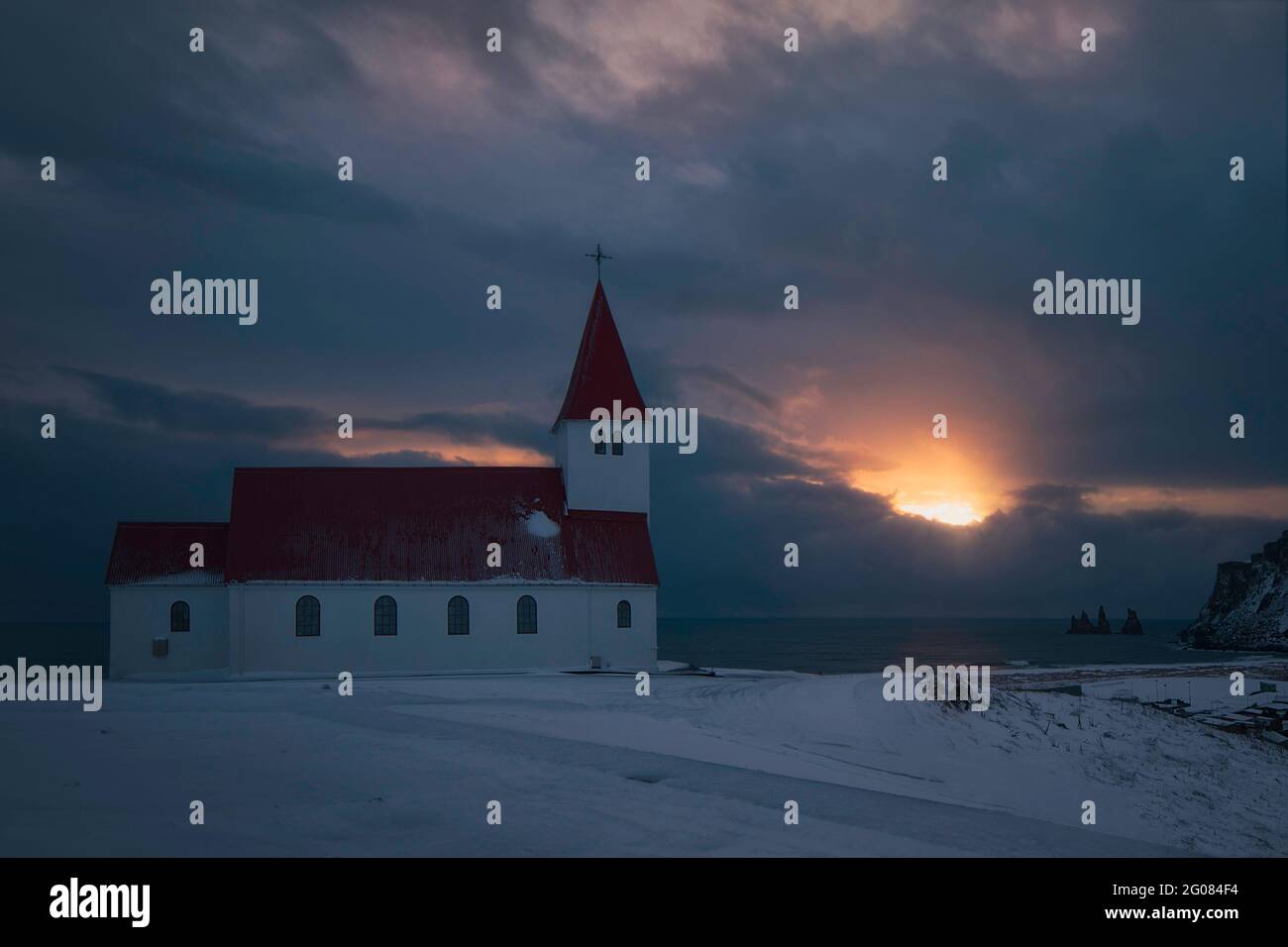 Sunset sky over church building Stock Photo - Alamy