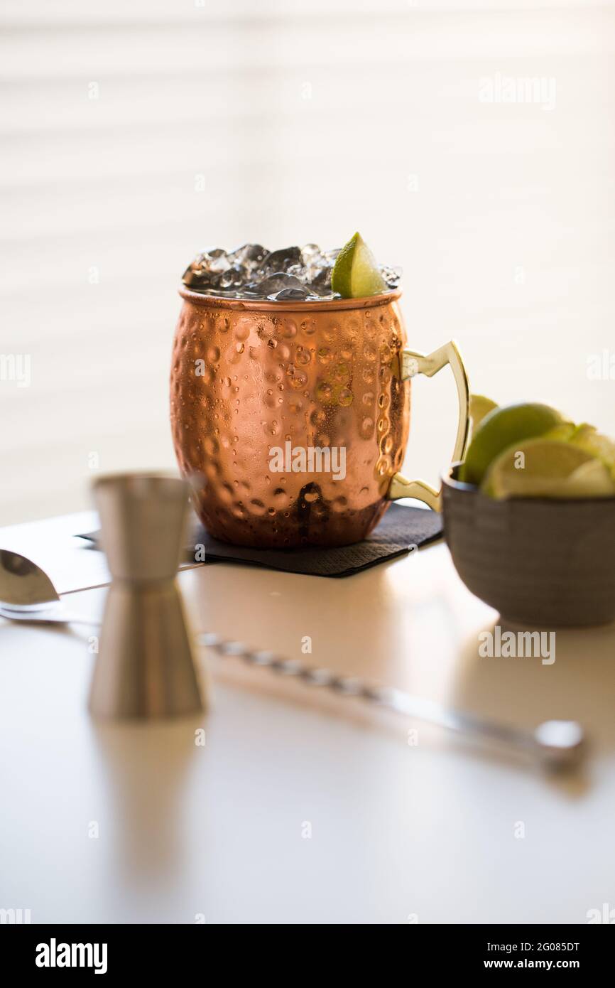 unrecognizable male butcher using mincing machine while grinding meat ...