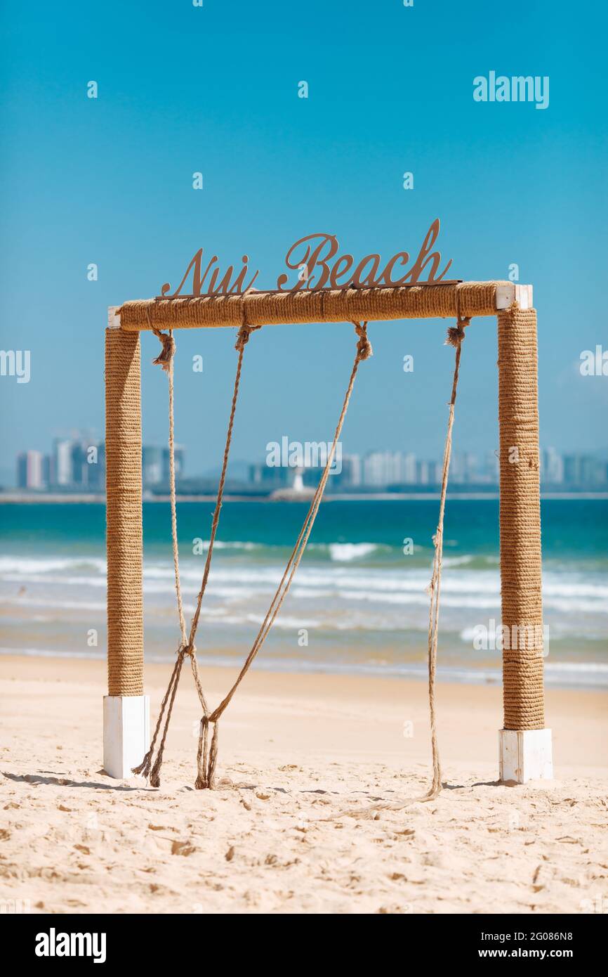 Wooden arch on sandy beach near blue sea Stock Photo - Alamy