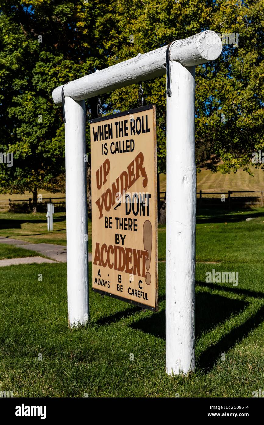 Historical safety sign, "When the roll is called up yonder, don't be ...