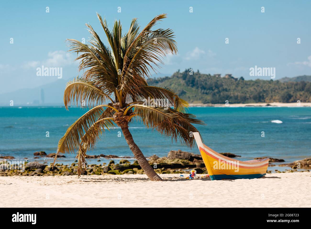 Natural landscape of sandy beach with palm and colorful boat Stock ...