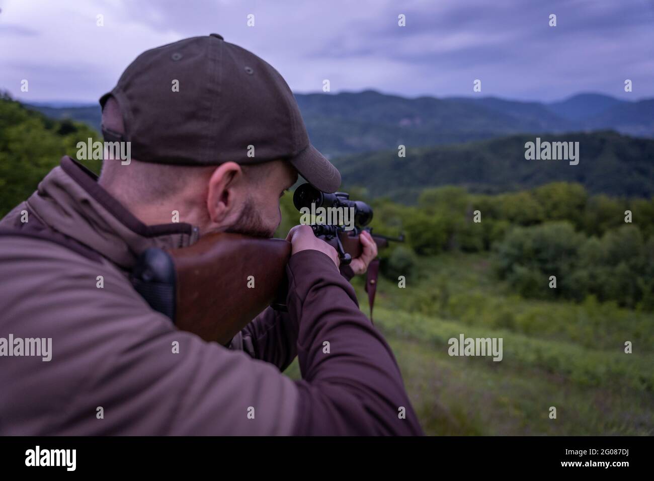 Young man hunting wildlife in the nature Stock Photo - Alamy