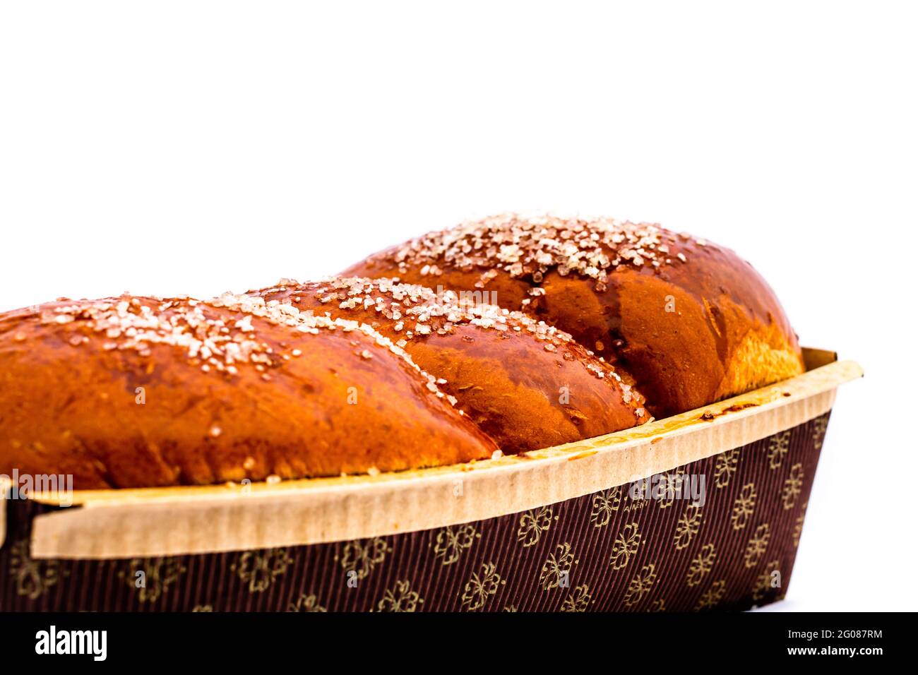 Closeup shot of a Cozonac sweet bread isolated on a white background ...