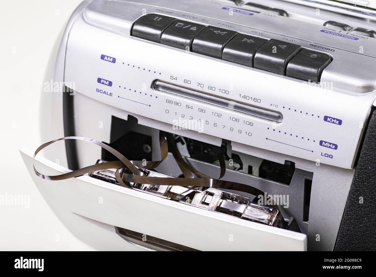 A tape from a cassette tape in a cassette radio. Breakdown in the old ...