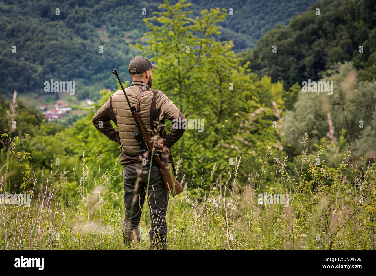 Hunter patiently waiting for wildlife to appear Stock Photo - Alamy