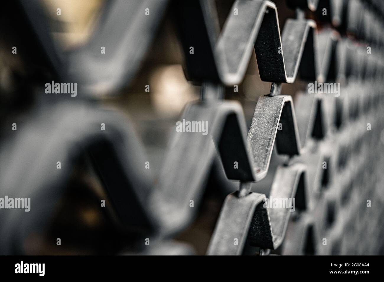 Selective focus of metal fences outdoors with a blurry background Stock ...