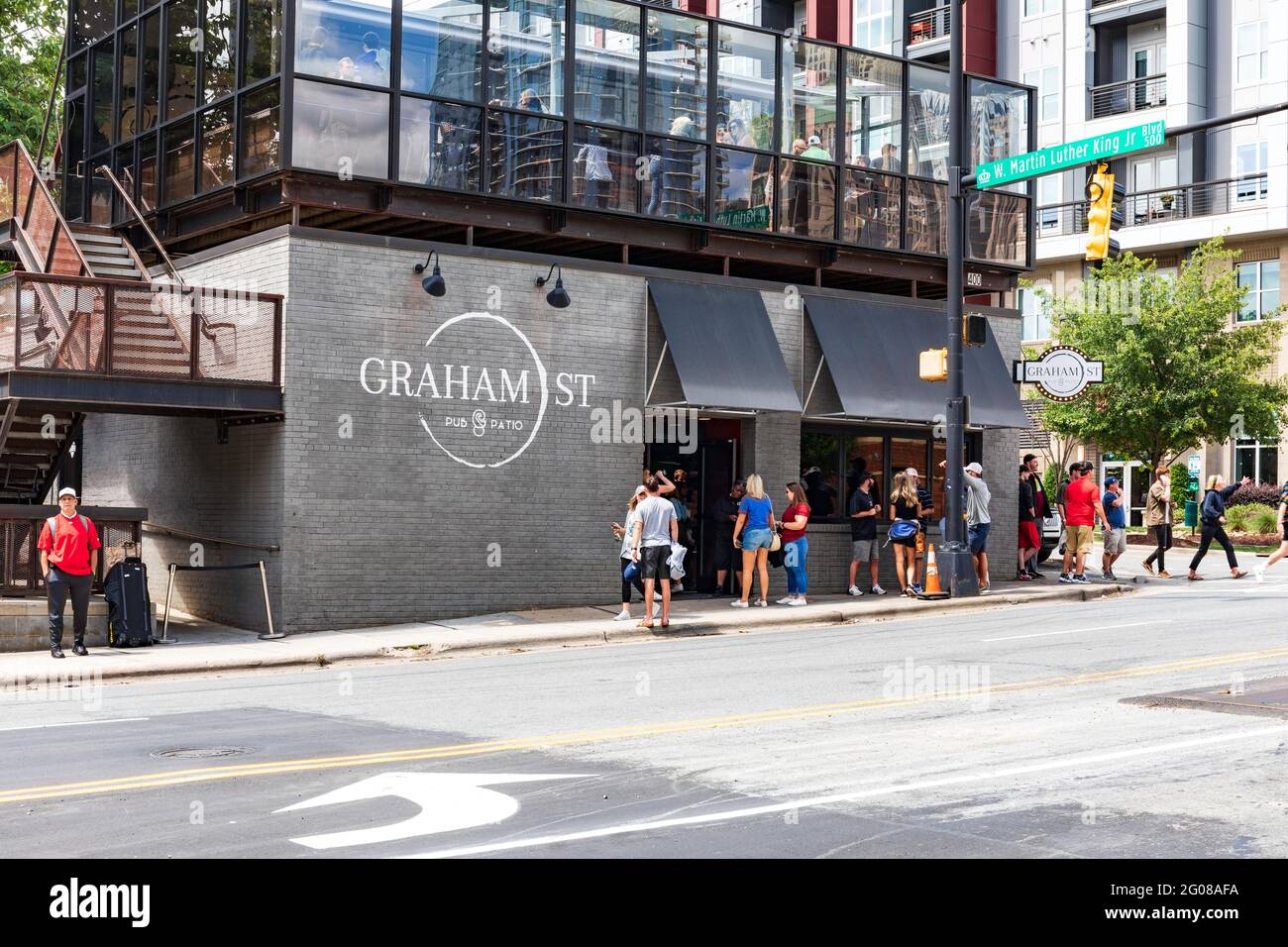 CHARLOTTE, NC, USA-30 MAY 2021: Young people line up for admission to ...