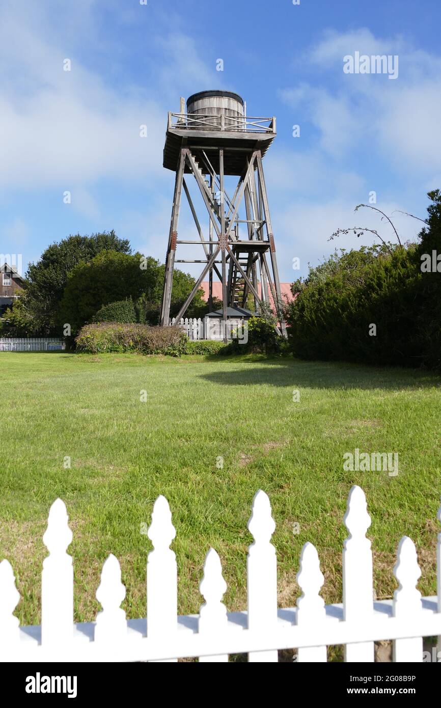 Mendocino water tower behind a white picket fence Stock Photo - Alamy