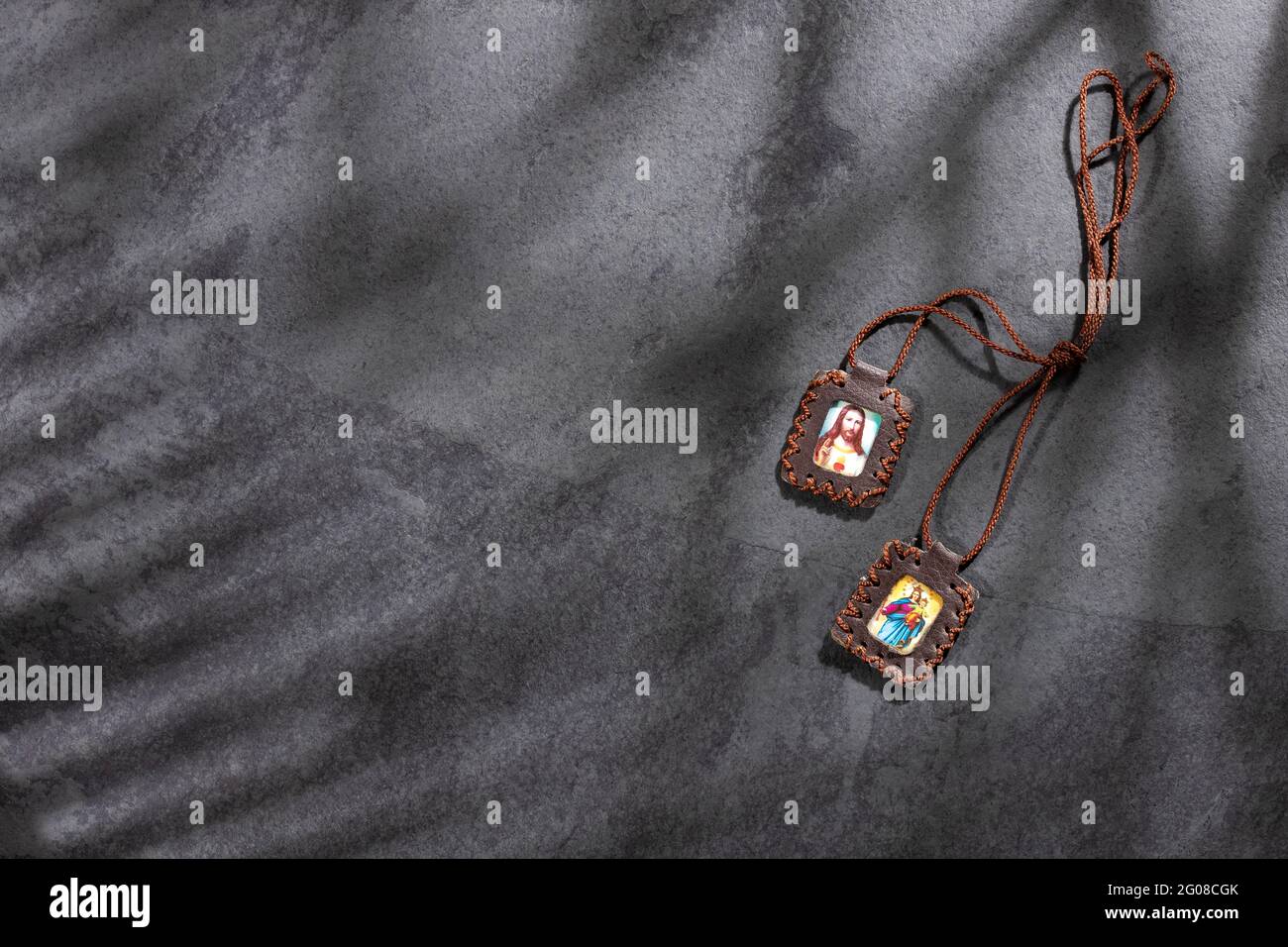 Catholic scapular, symbol of the Christian faith Stock Photo - Alamy