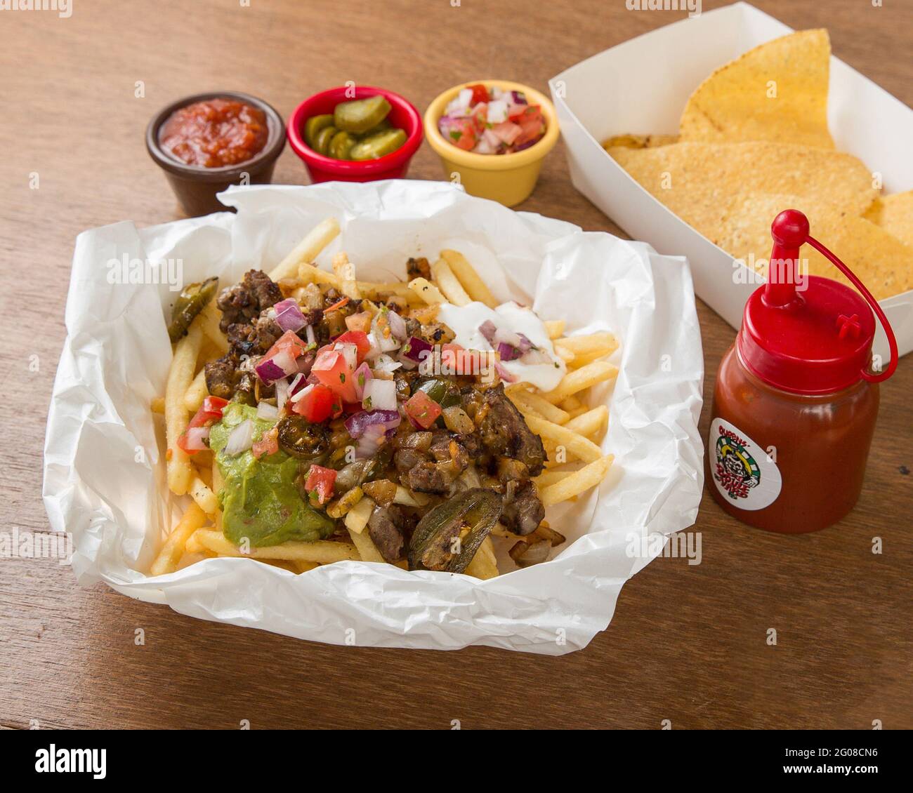 Mix of Mexican food on restaurant table Stock Photo - Alamy