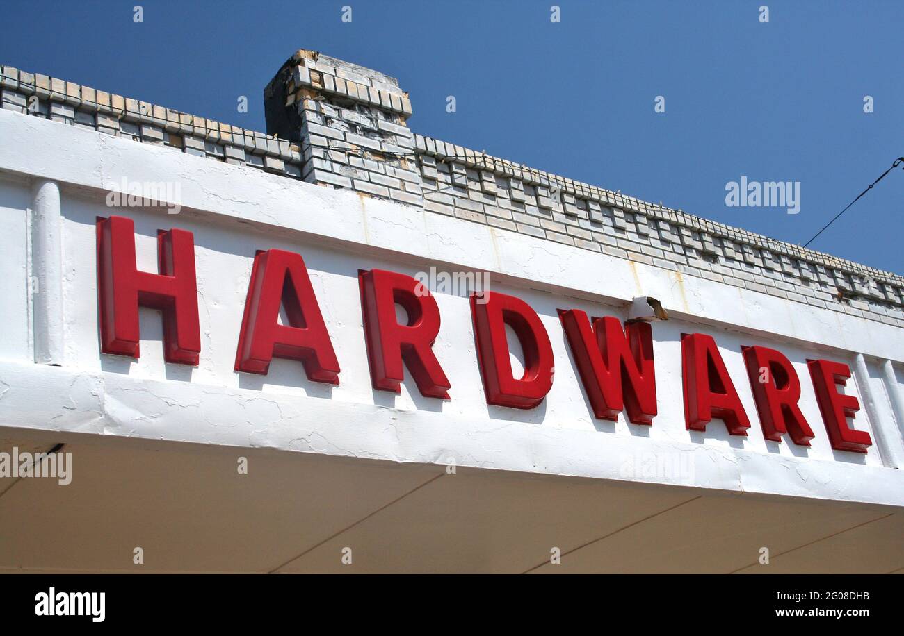 Historic Buildings in Rural Small Town Hardware Sign Stock Photo - Alamy