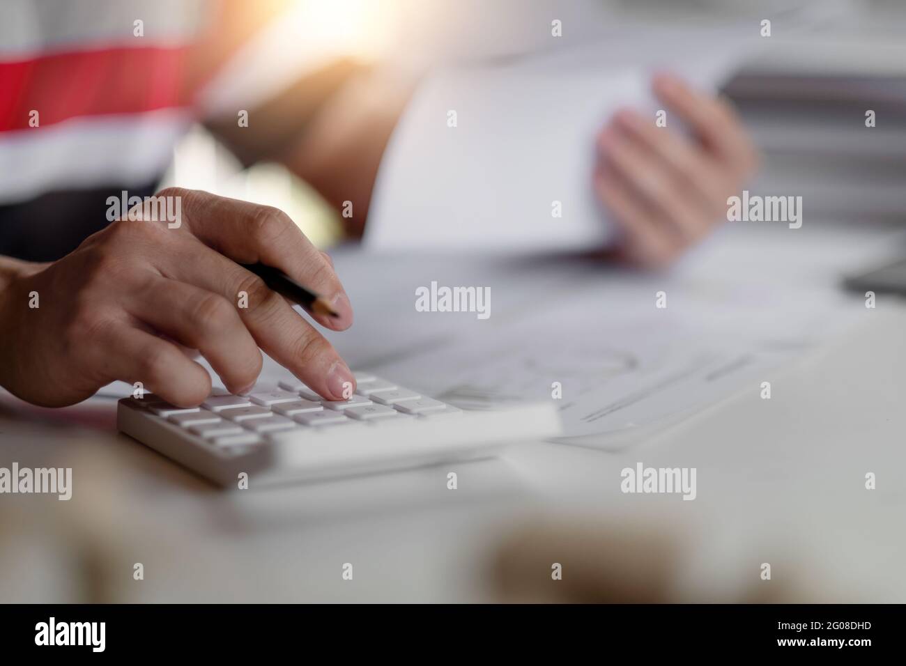 Woman holding bills check hi-res stock photography and images - Alamy
