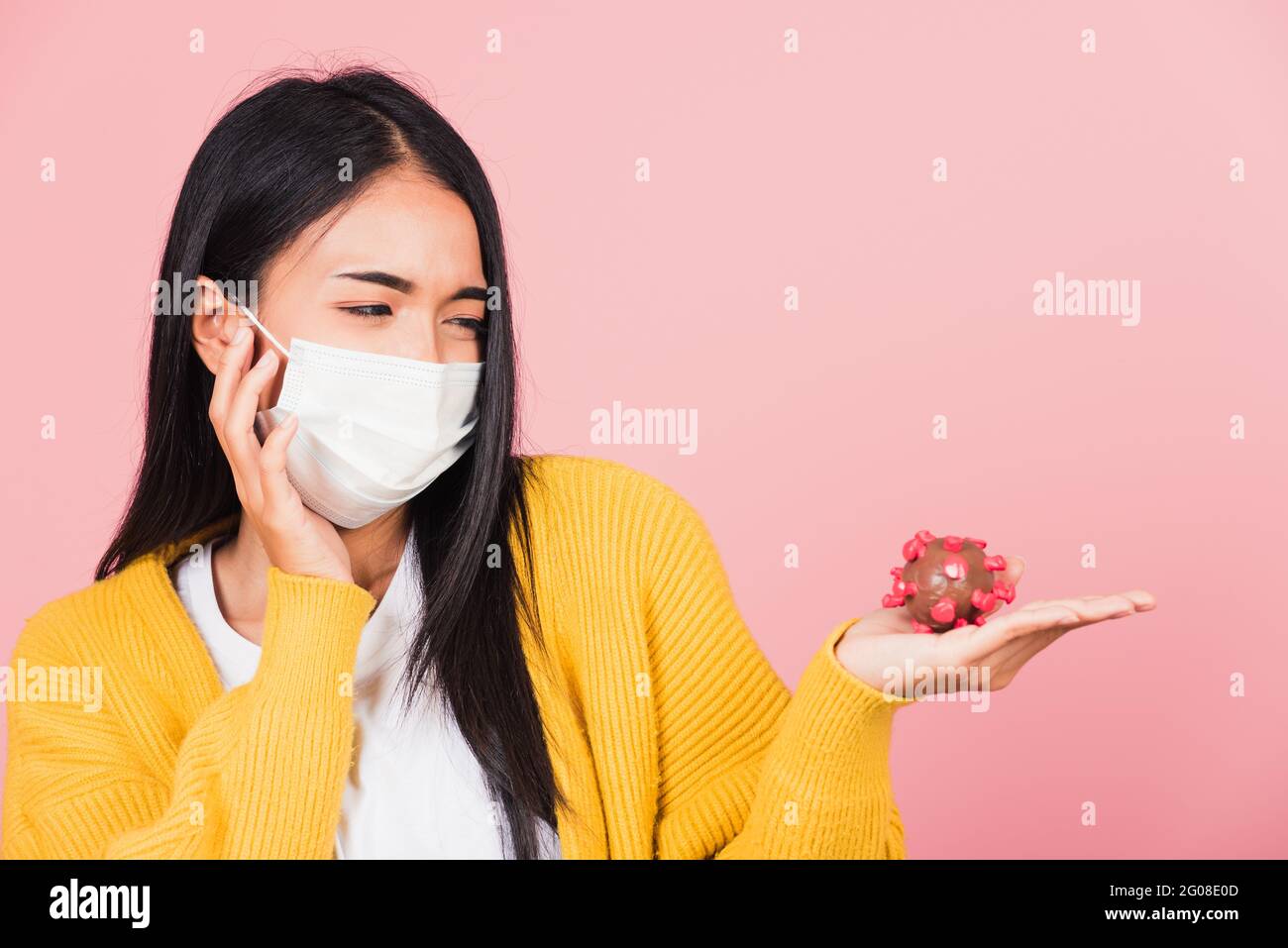 Portrait of Asian young woman wear face mask protective holding DNA ...
