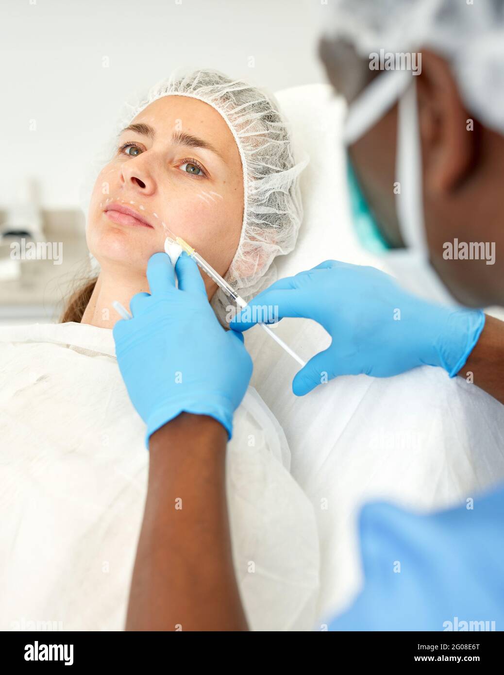Beautician making beauty injection hi-res stock photography and images ...