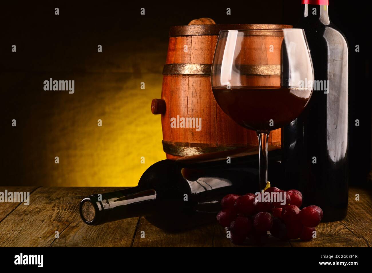 Glass and bottle of wine on the table Stock Photo - Alamy
