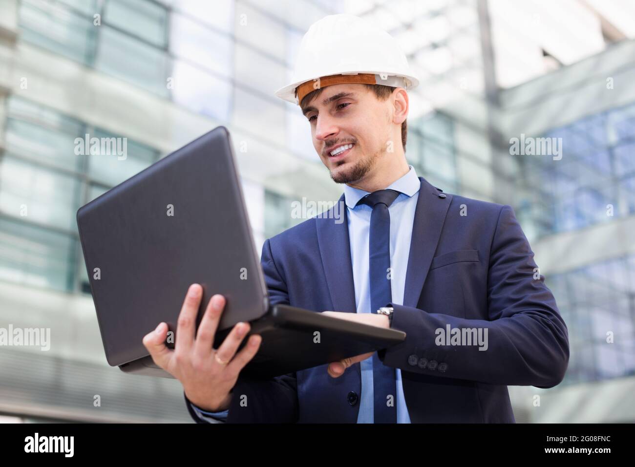 Engineer builder working documents hi-res stock photography and images ...