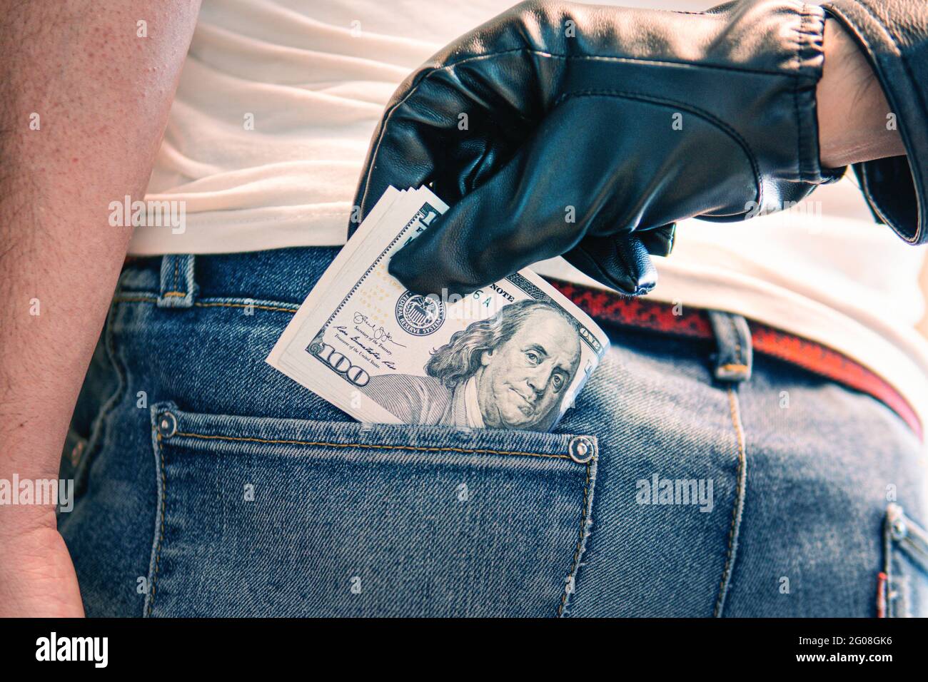 Black gloved hand hi-res stock photography and images - Alamy