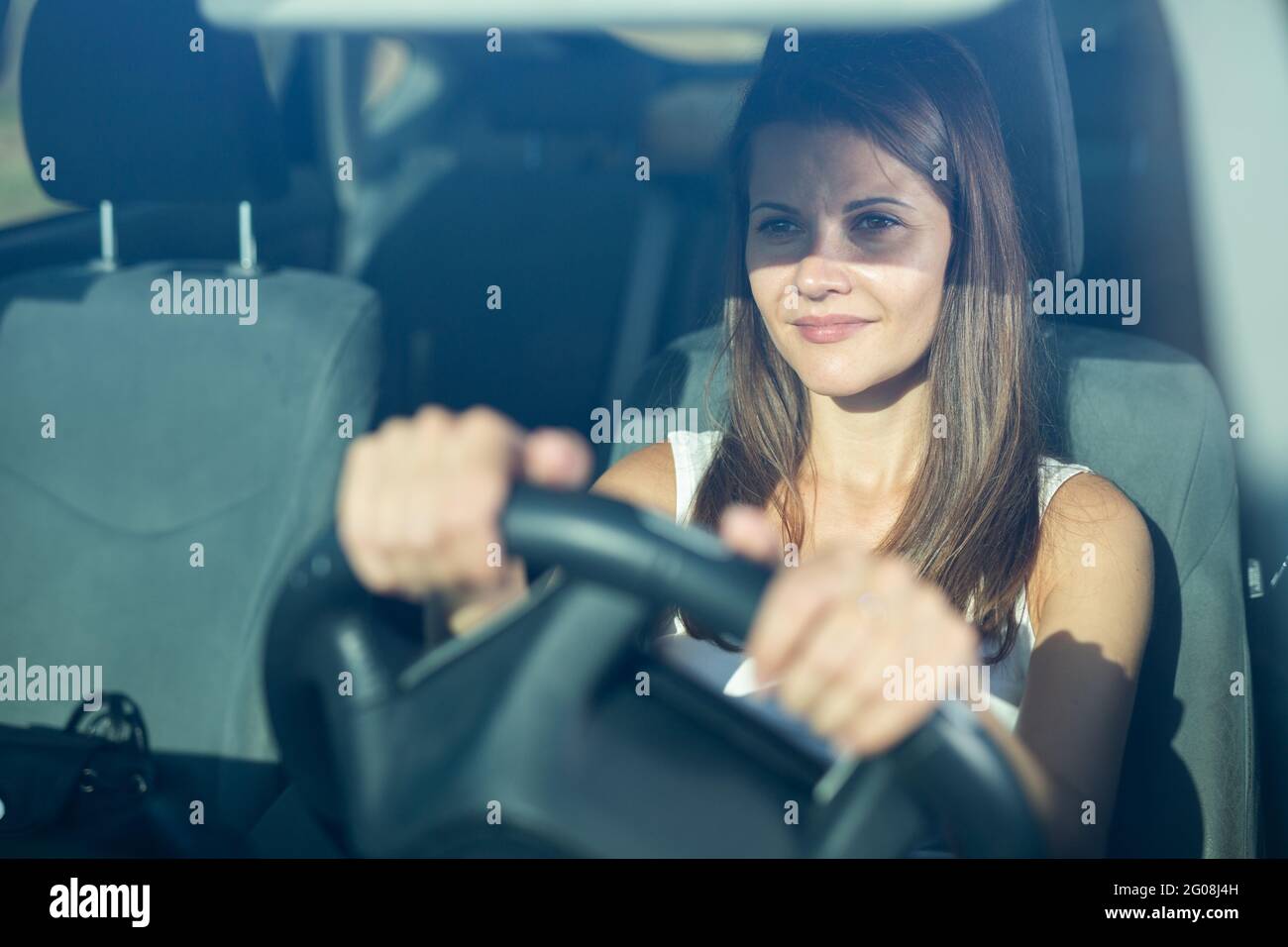 Female driver smiling hi-res stock photography and images - Alamy