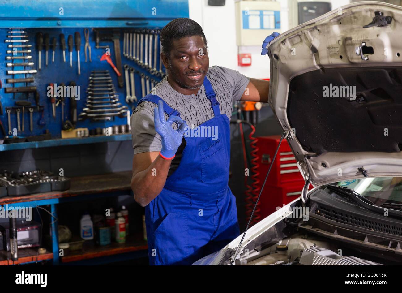 Positive african man makes hi-res stock photography and images - Alamy