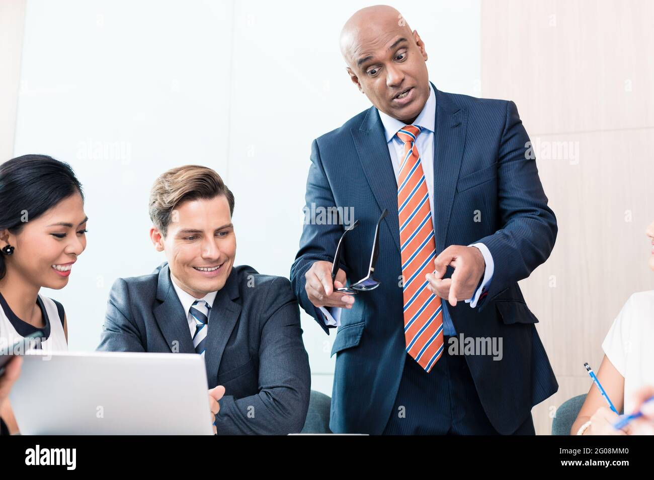 Executive in suit explaining indian hi-res stock photography and images ...