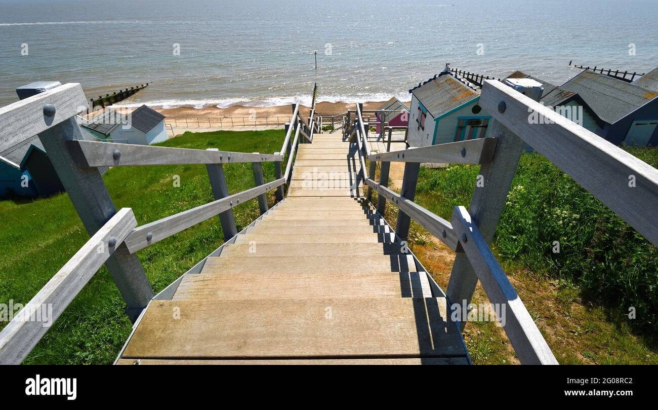 Wooden steps leading down to the sea , steps , beach huts, beach and ...