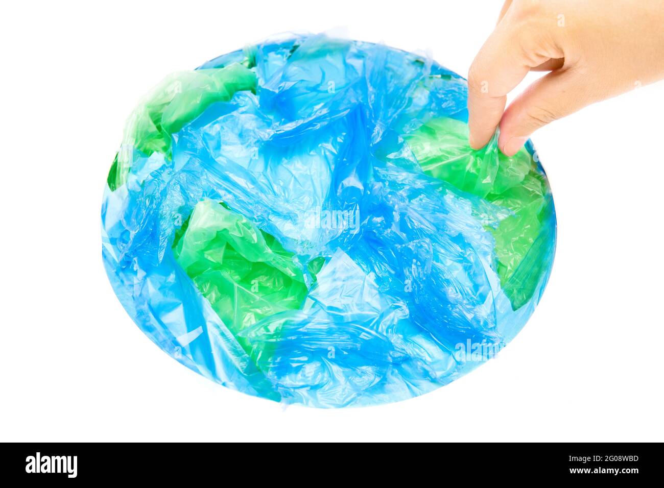 Human hand cleaning the Earth globe made of plastic bags isolated on ...