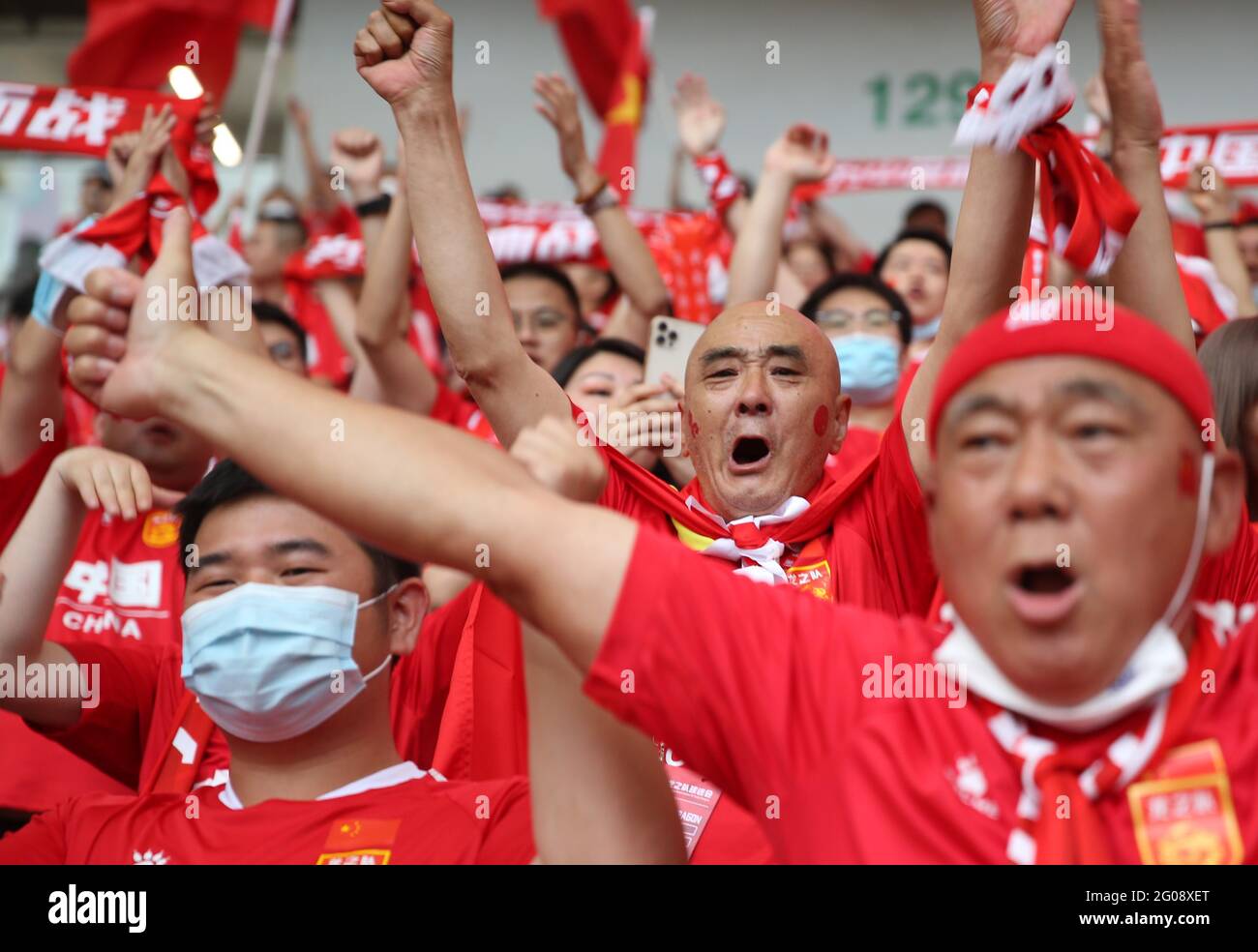 Beijing, China's Jiangsu Province. 30th May, 2021. Fans of Team China ...