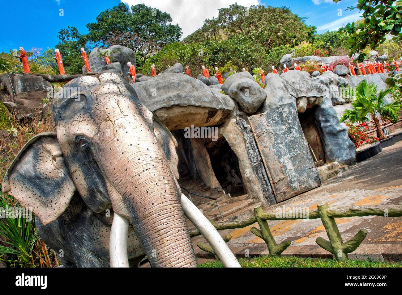 Sacred Elephants and Monks Sculptures, Golden Temple of Dambulla ...