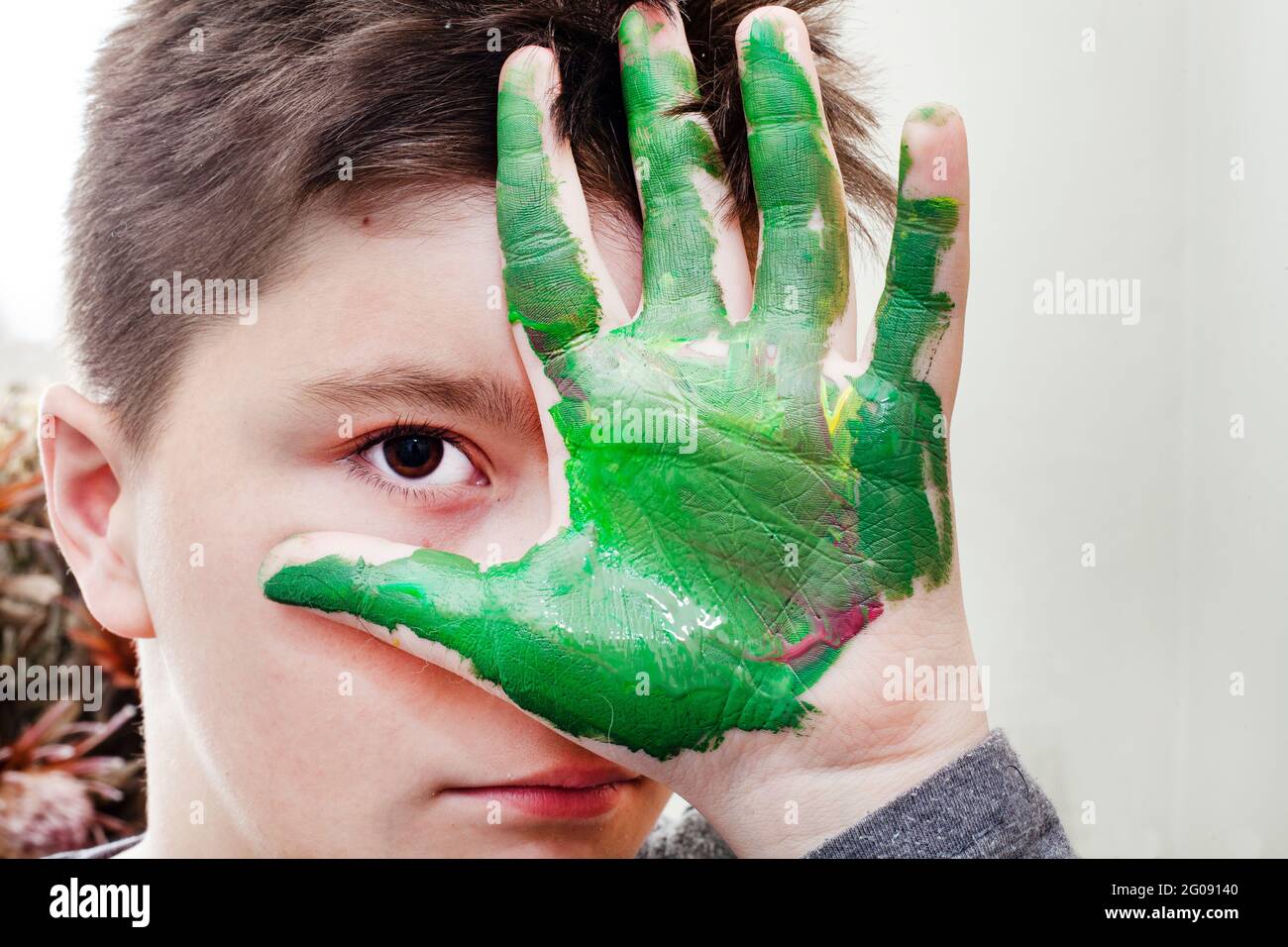 messy paint and arts and crafts for kids Stock Photo - Alamy