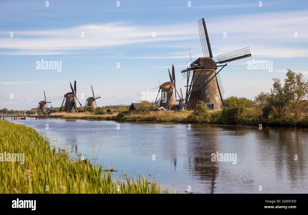 Traditional dutch windmills in village Kinderdijk, Holland Stock Photo ...