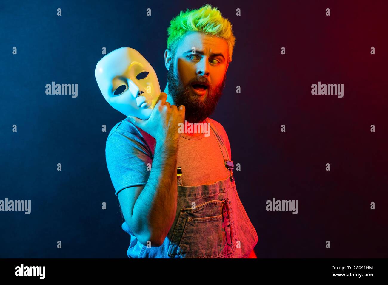 Mysterious facial expression hi-res stock photography and images - Alamy