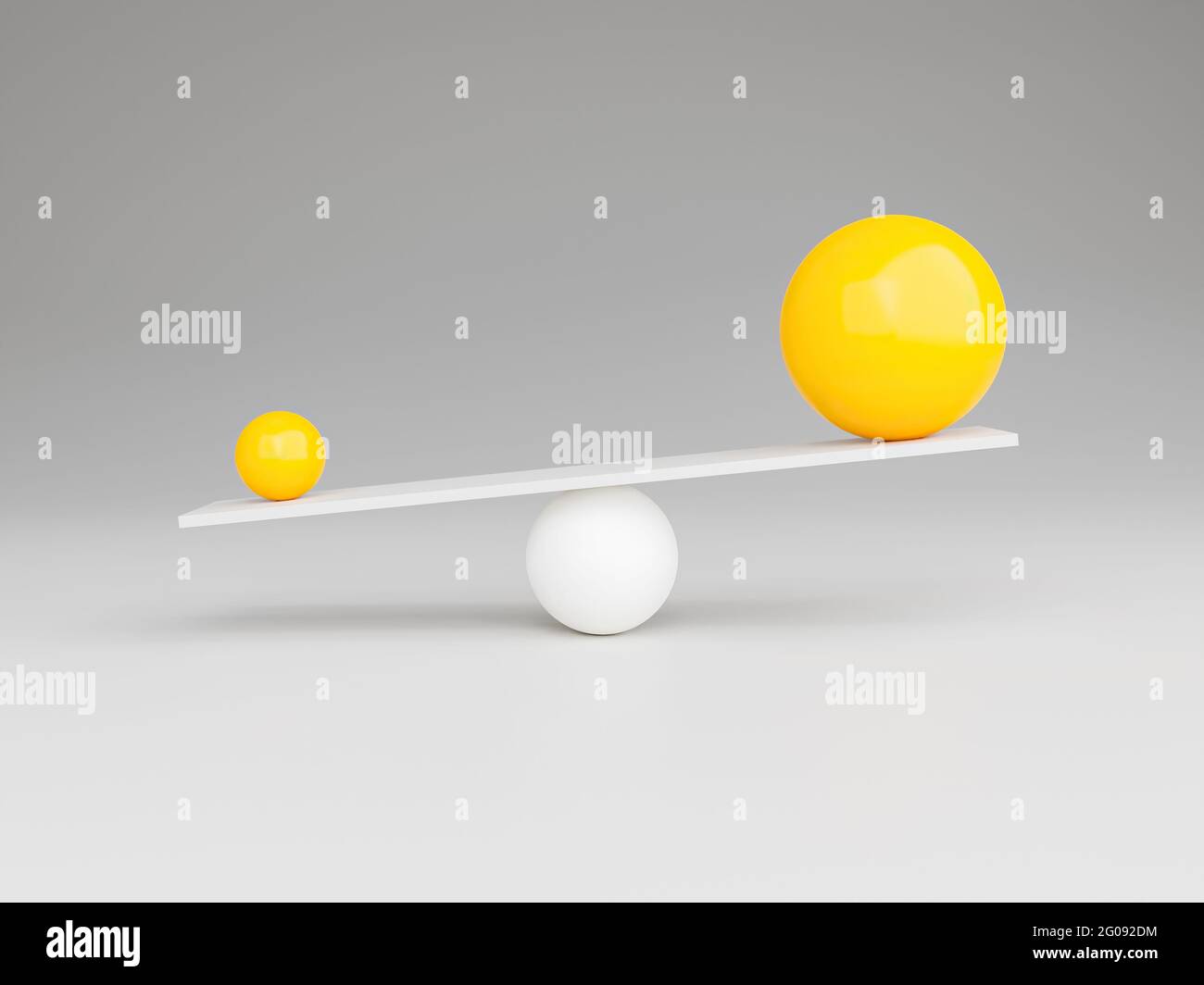 spheres in balance with different sizes and the small one with more ...