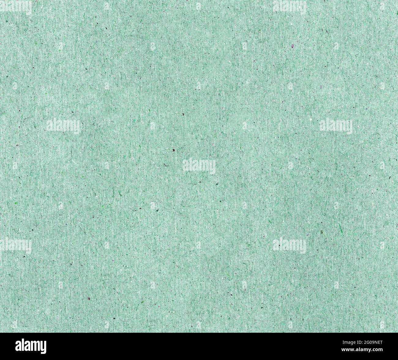 green cardboard texture useful as a background Stock Photo - Alamy