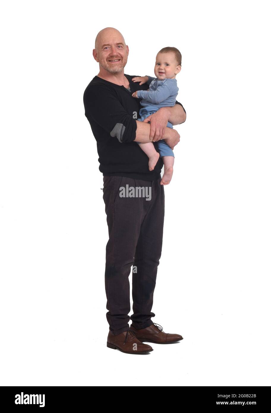 view of a father carrying her baby on white background Stock Photo - Alamy