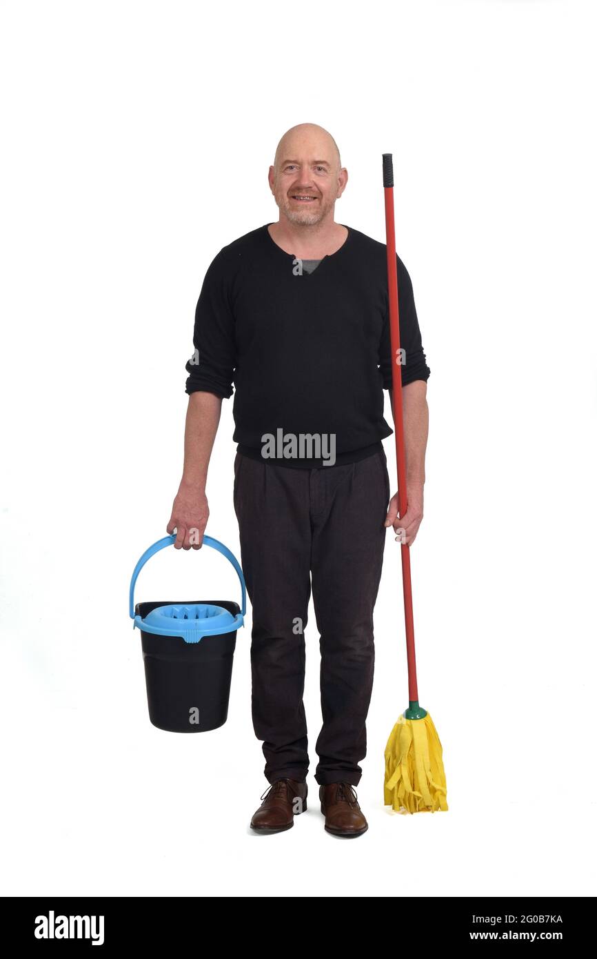 front view of a portrait of man with a mop and bucket looking at camera ...