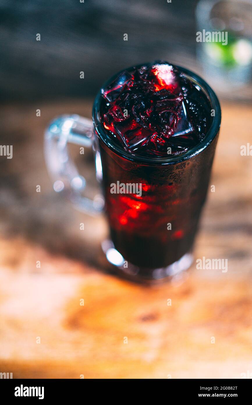 A glass of dark juice cocktail drink Stock Photo - Alamy